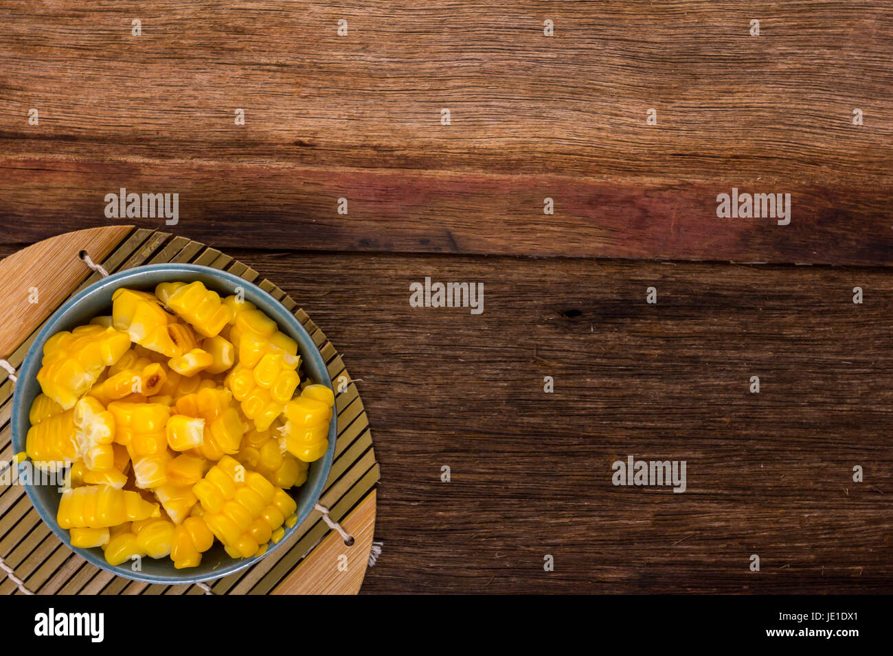 split corn on wood background, View from above with copy space Stock ...