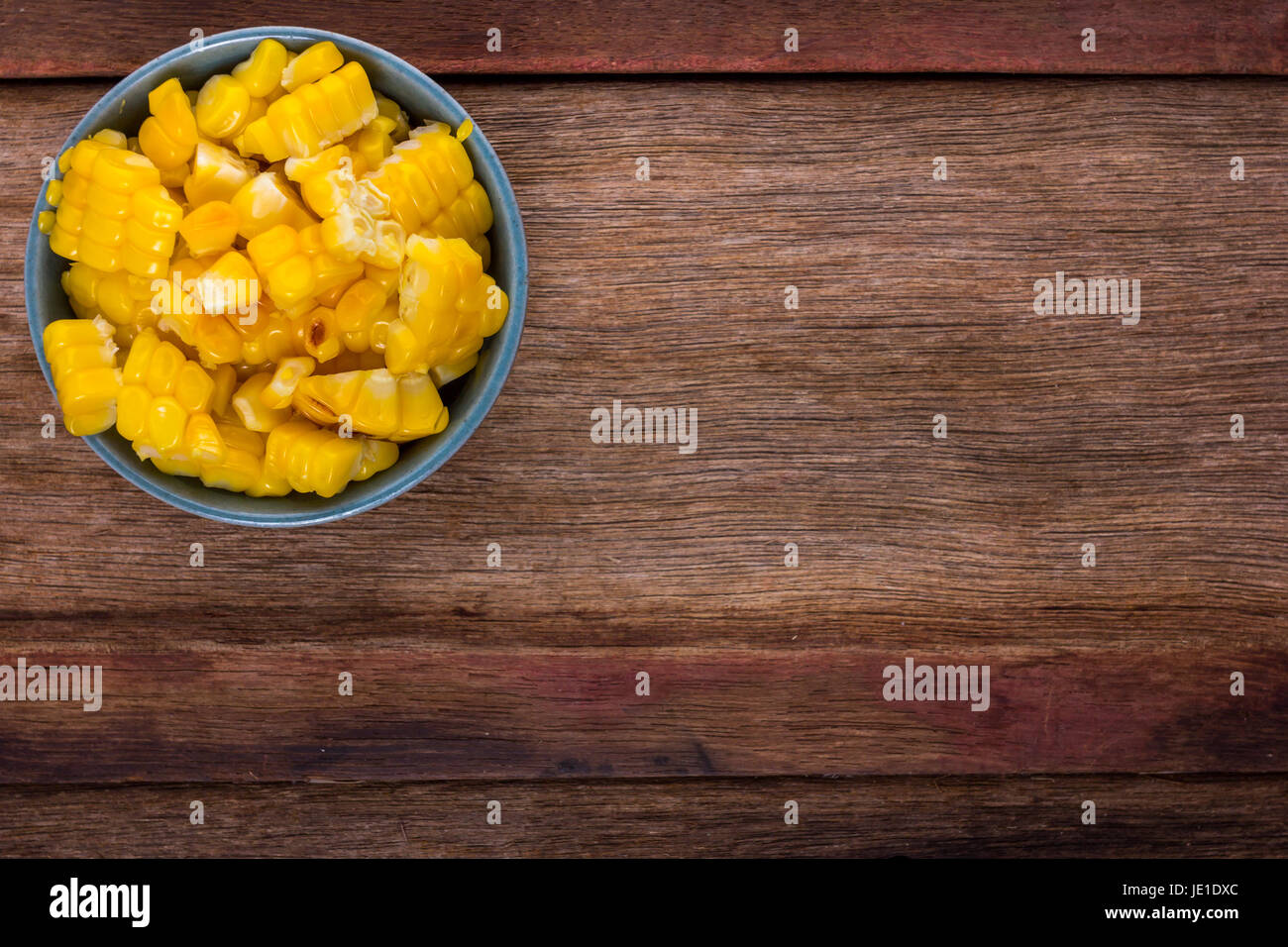 split corn on wood background, View from above with copy space Stock ...