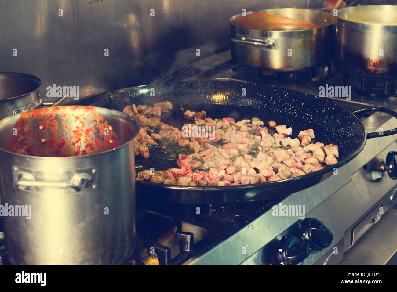 Meat in grill pan Stock Photo - Alamy