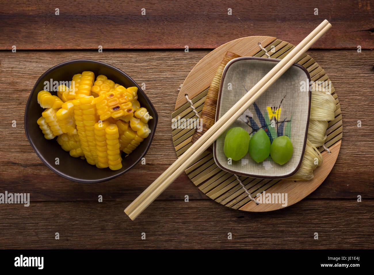 split corn on wood background, View from above with copy space Stock ...