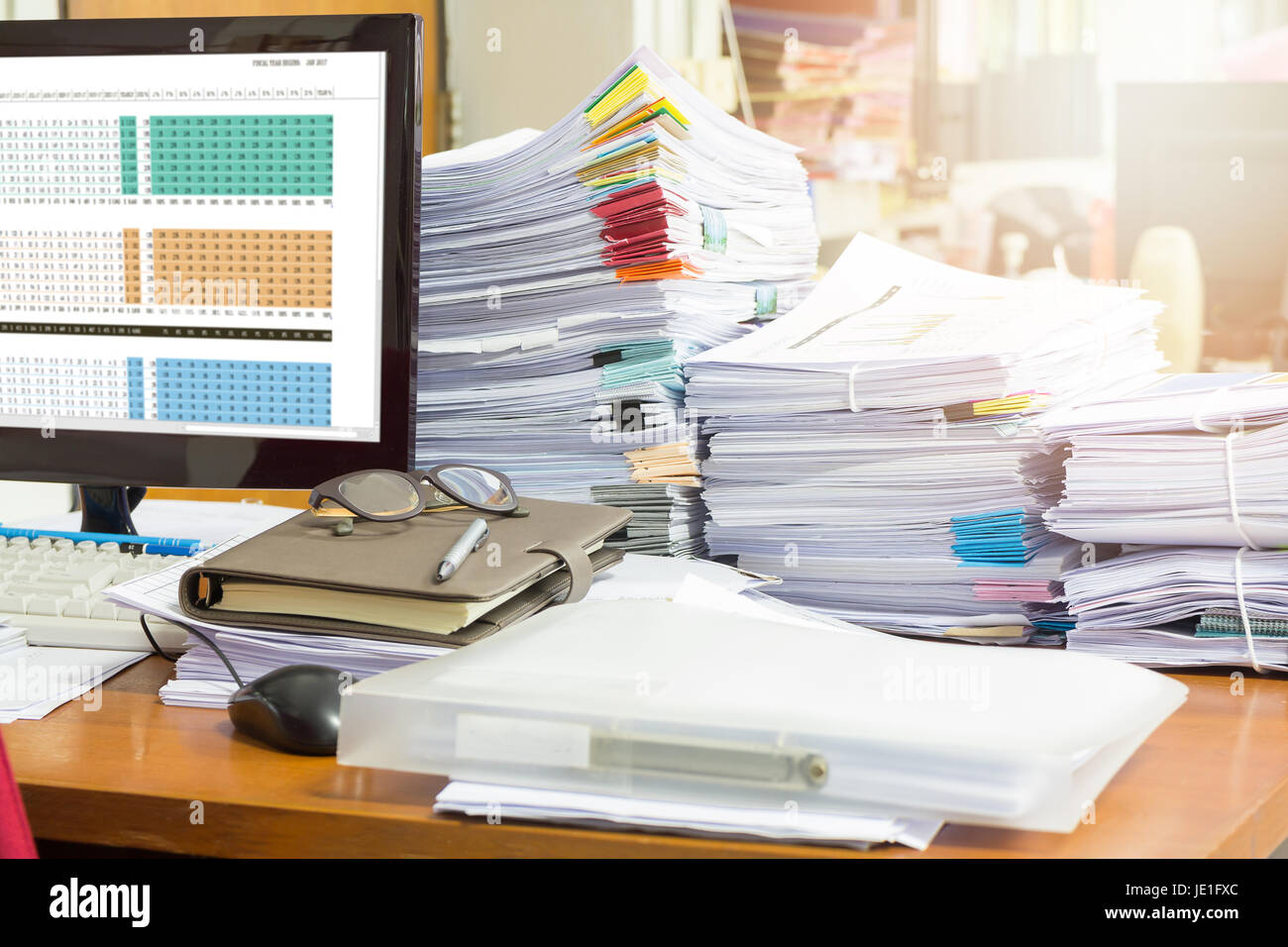 Pile of unfinished documents on office desk, Stack of business paper ...