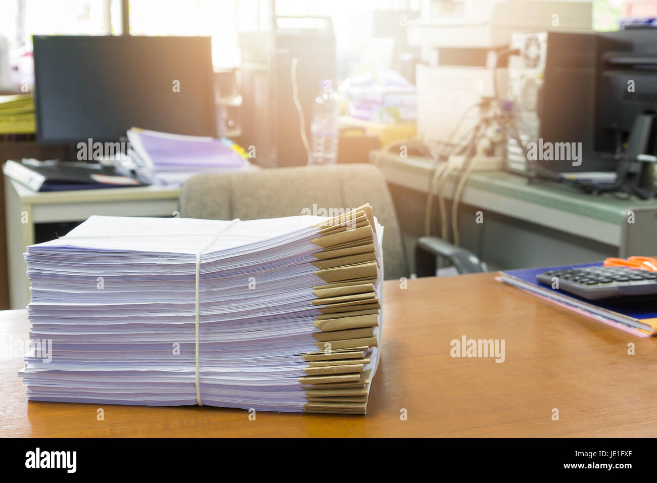 Pile of unfinished documents on office desk, Stack of business paper ...