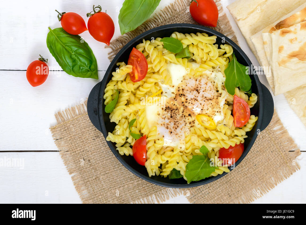 Fusilli pasta fried eggs hi-res stock photography and images - Alamy