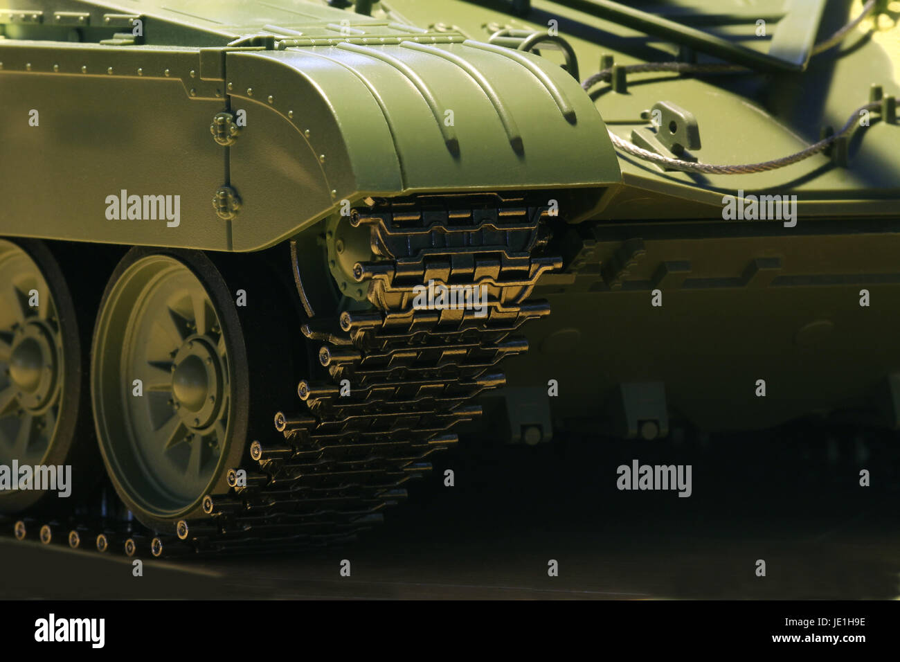 Tank tracks and steel wheels huge green panzer Stock Photo - Alamy