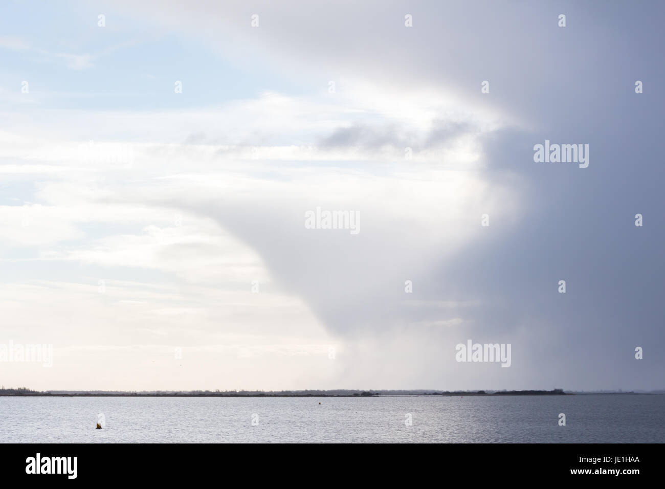 Raincloud above a dutch lake, north of the country Stock Photo - Alamy