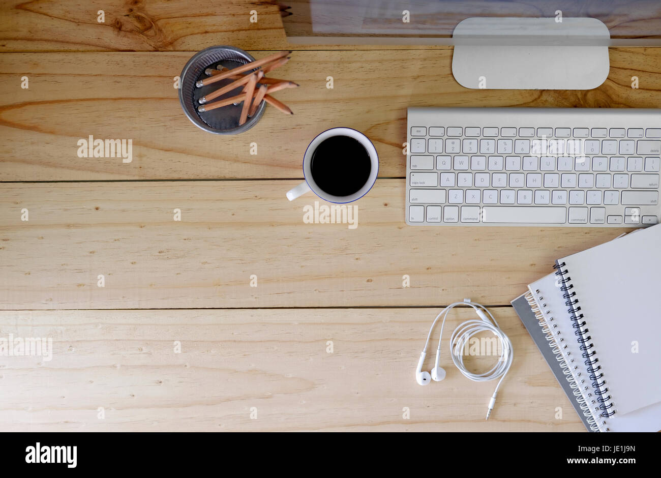 Workspace modern desktop computer on wood table and office stuff. top ...