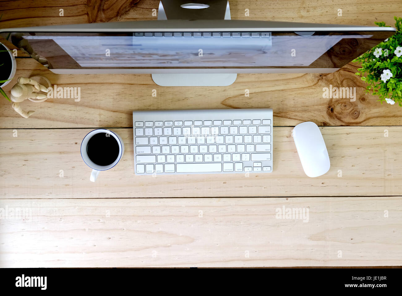 Workspace modern desktop computer on wood table and office stuff. top ...