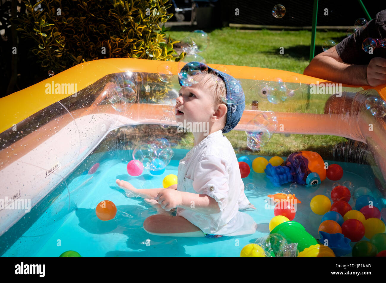 Child playing balls hi-res stock photography and images - Alamy
