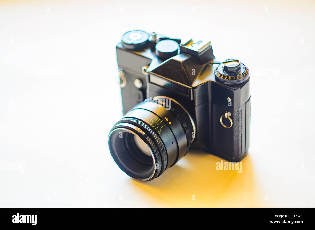 Old black slr camera on white background Stock Photo - Alamy