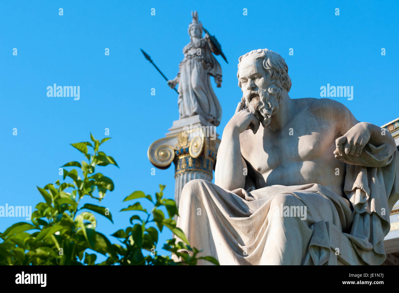 classical statue of Socrates from side with athena statue above and ...
