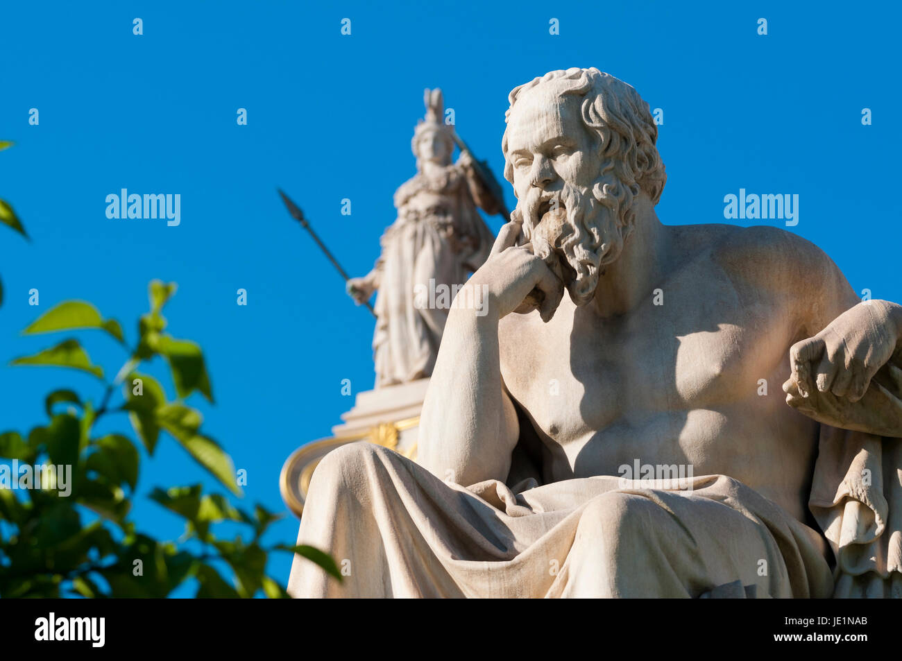 classical statue of Socrates from side with athena statue above and ...