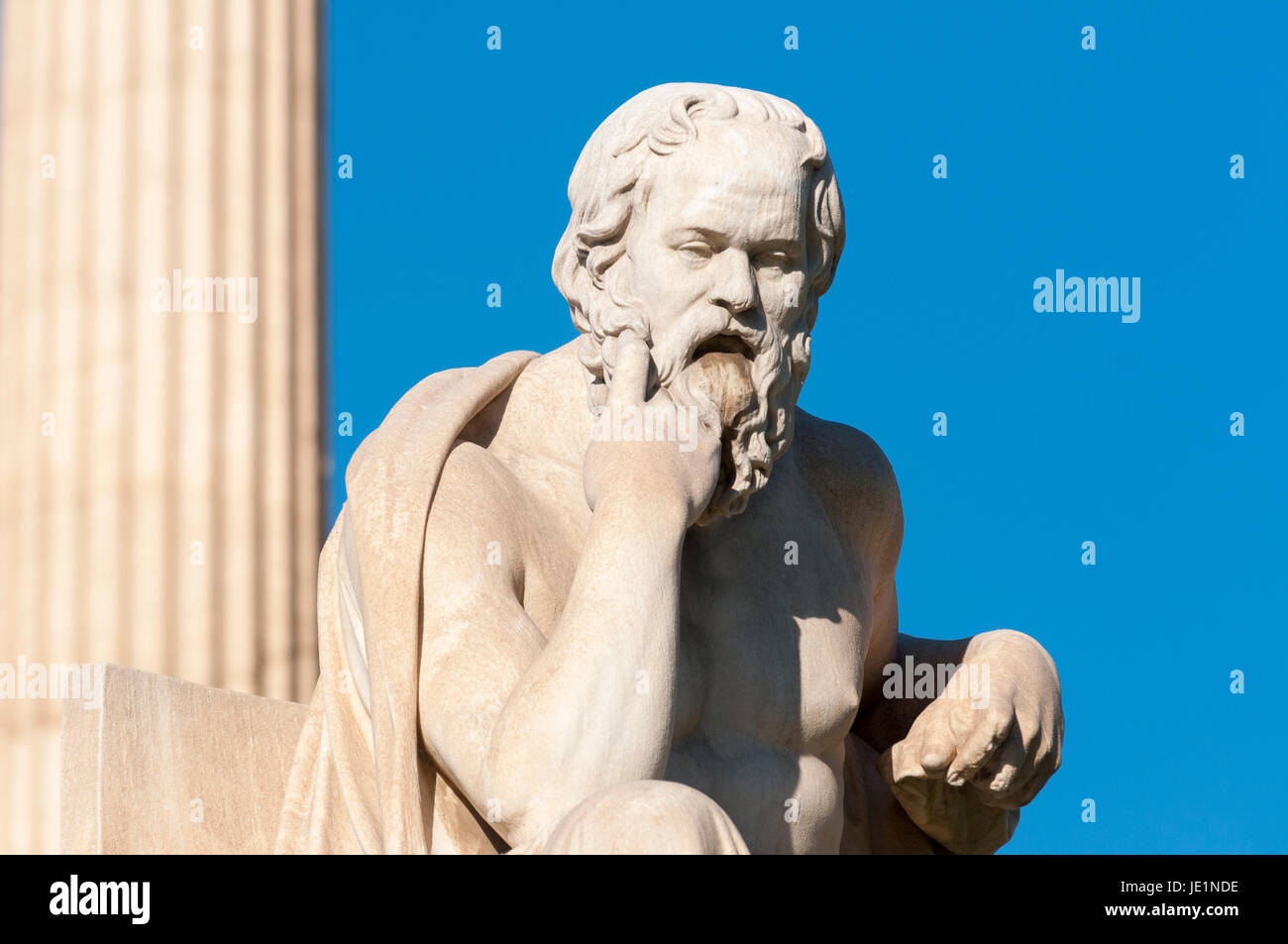 classical statue of Socrates in front of a column Stock Photo - Alamy