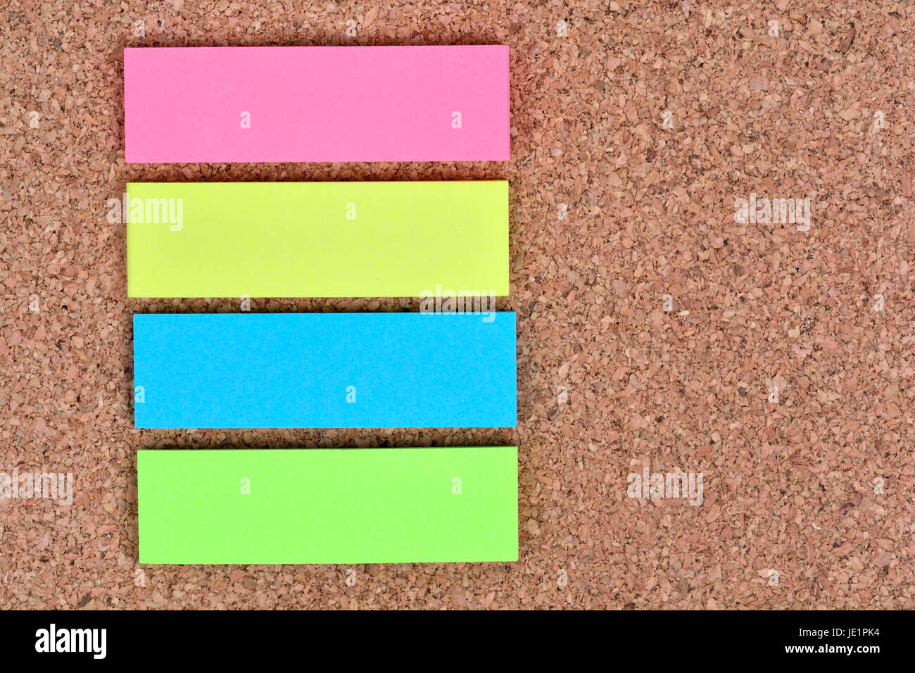 Empty colorful notes on cork background Stock Photo - Alamy