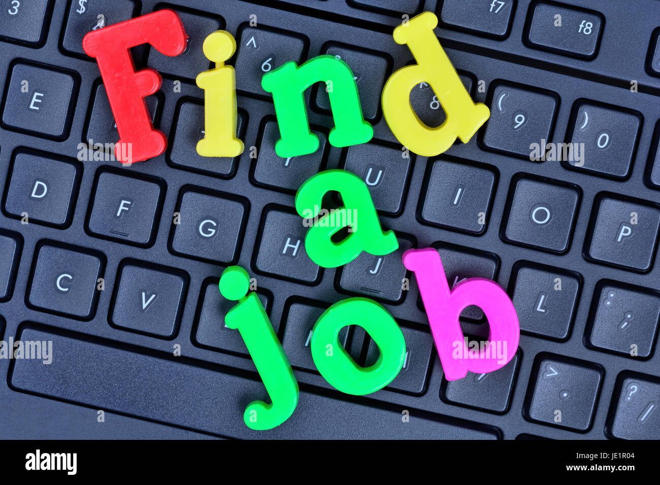 Find a job words on computer keyboard closeup Stock Photo - Alamy