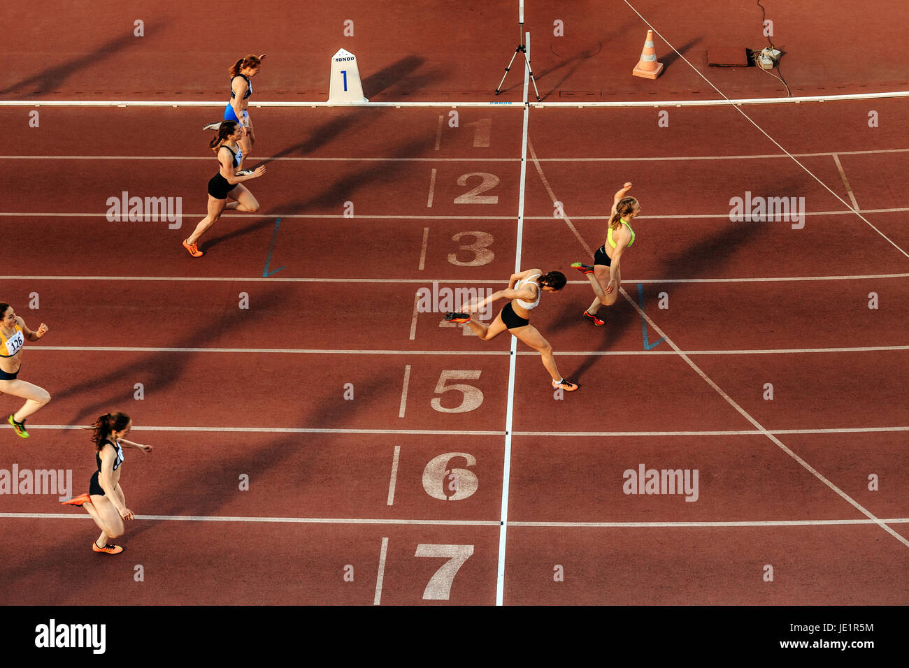 finish runners group women sprint race at stadium during UrFO ...