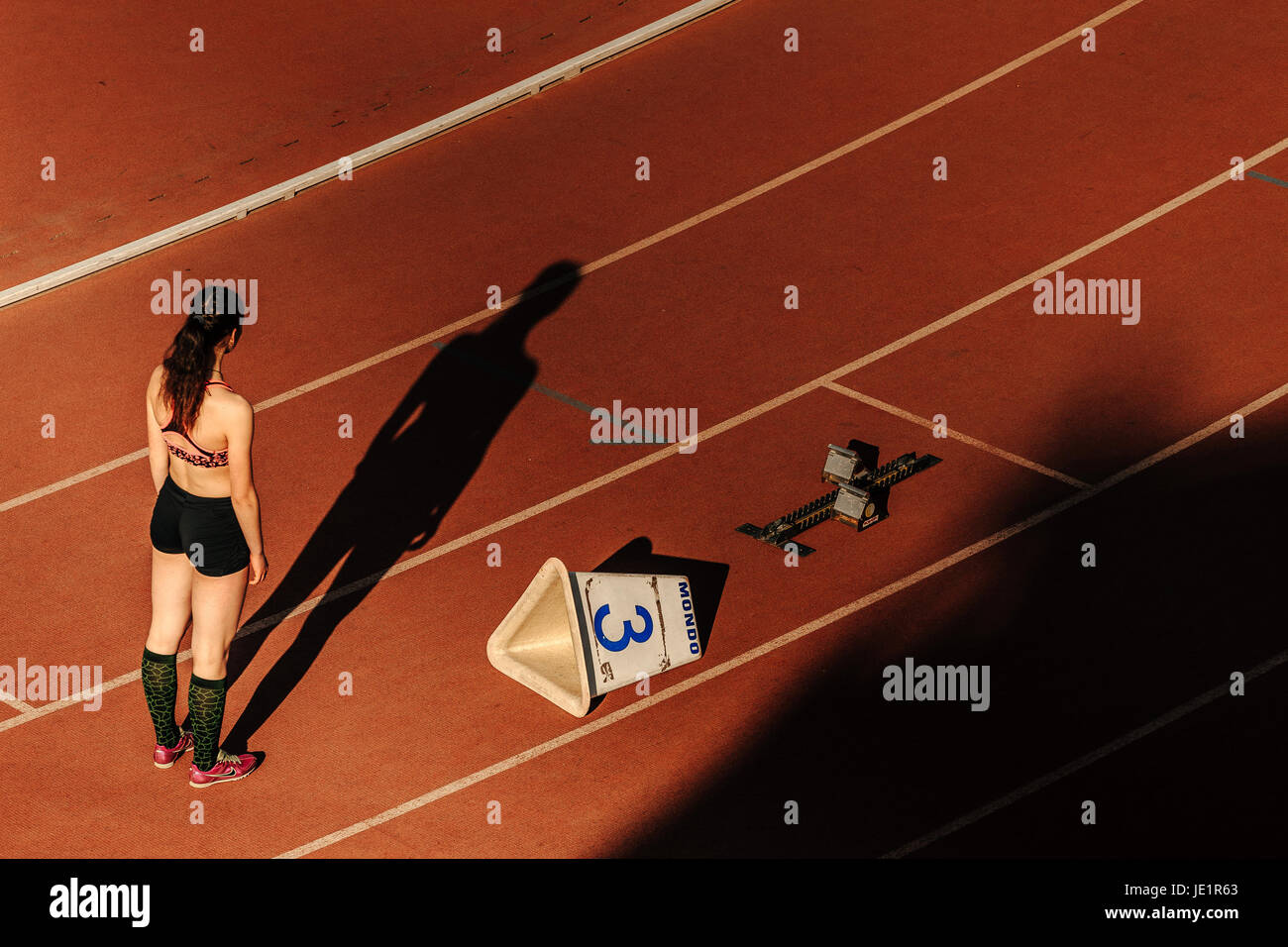shadow girl runner start race of 400 meters during UrFO Championship in ...