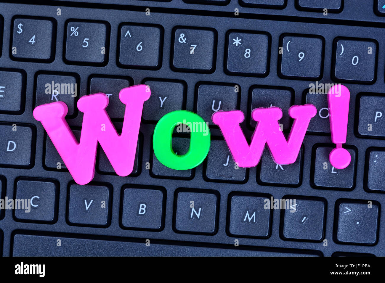 Wow word on computer keyboard closeup Stock Photo - Alamy