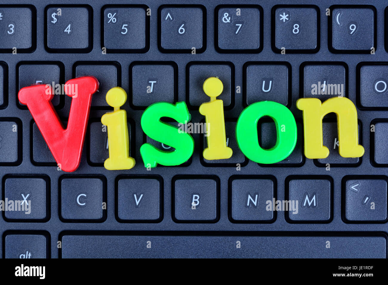 Vision word on computer keyboard closeup Stock Photo - Alamy