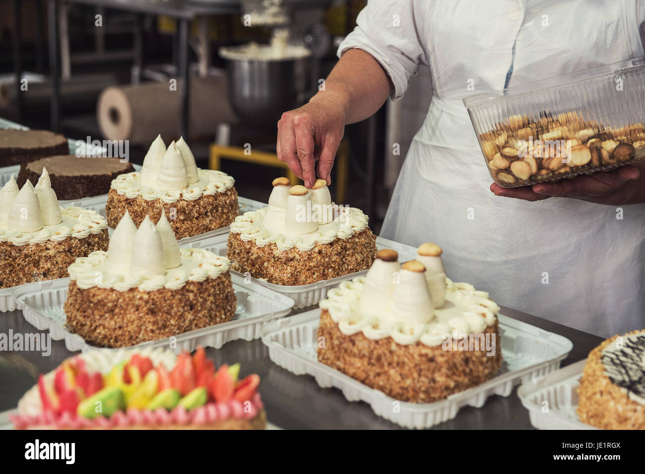 Manual cakes production Stock Photo - Alamy
