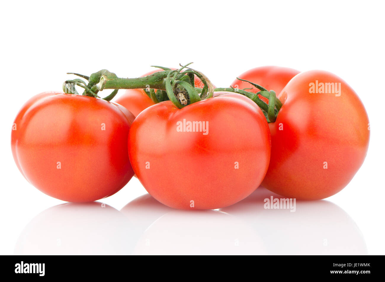 Red ripe tomato vine isolated on white background Stock Photo - Alamy