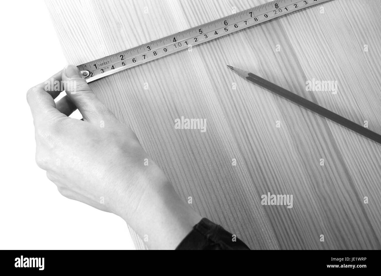 Woman measure tape Black and White Stock Photos & Images - Alamy