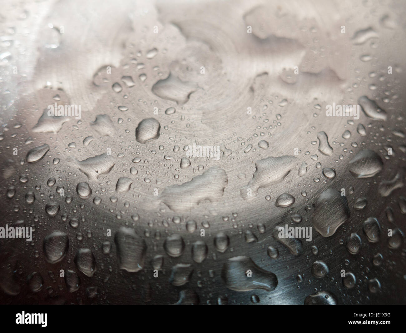 Water droplets on a shiny metal surface Stock Photo - Alamy