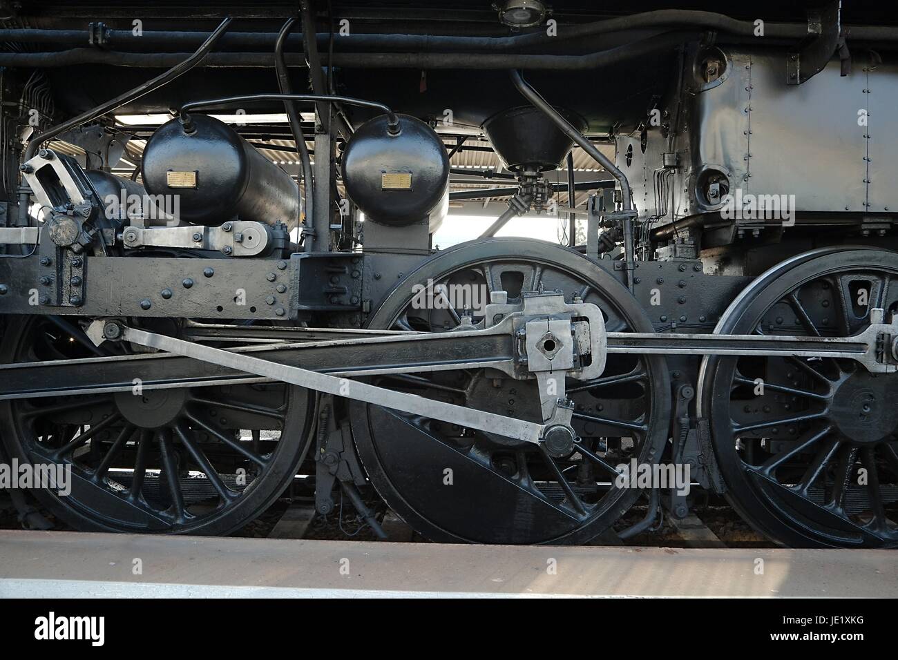 Steam locomotive rolling by close Stock Photo - Alamy