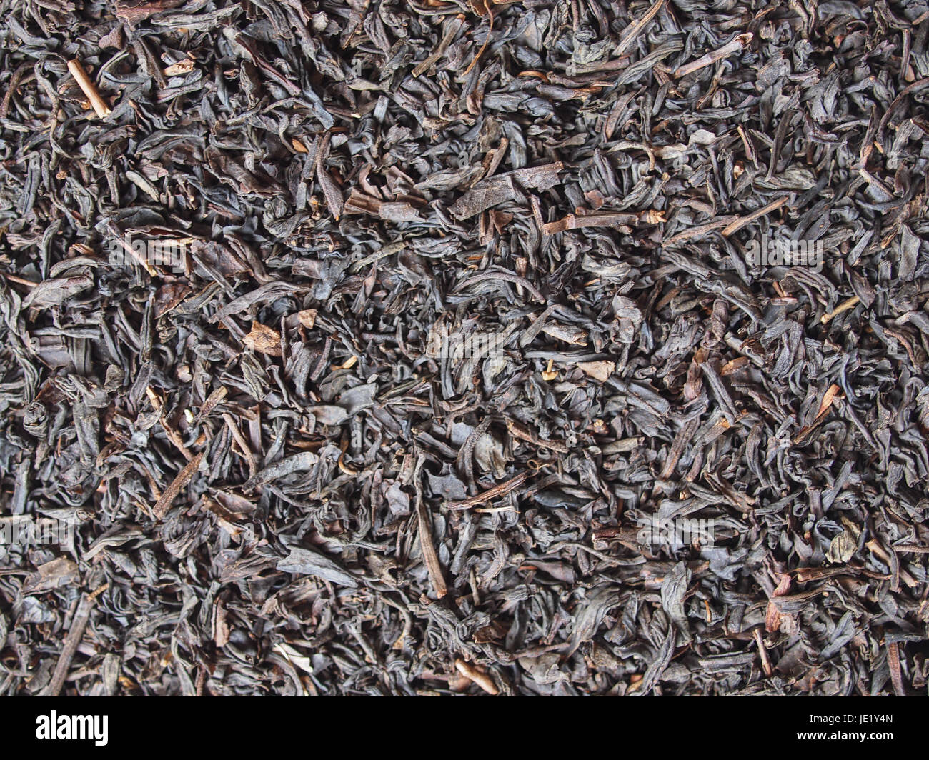 Loose tea leaves useful as a background Stock Photo - Alamy