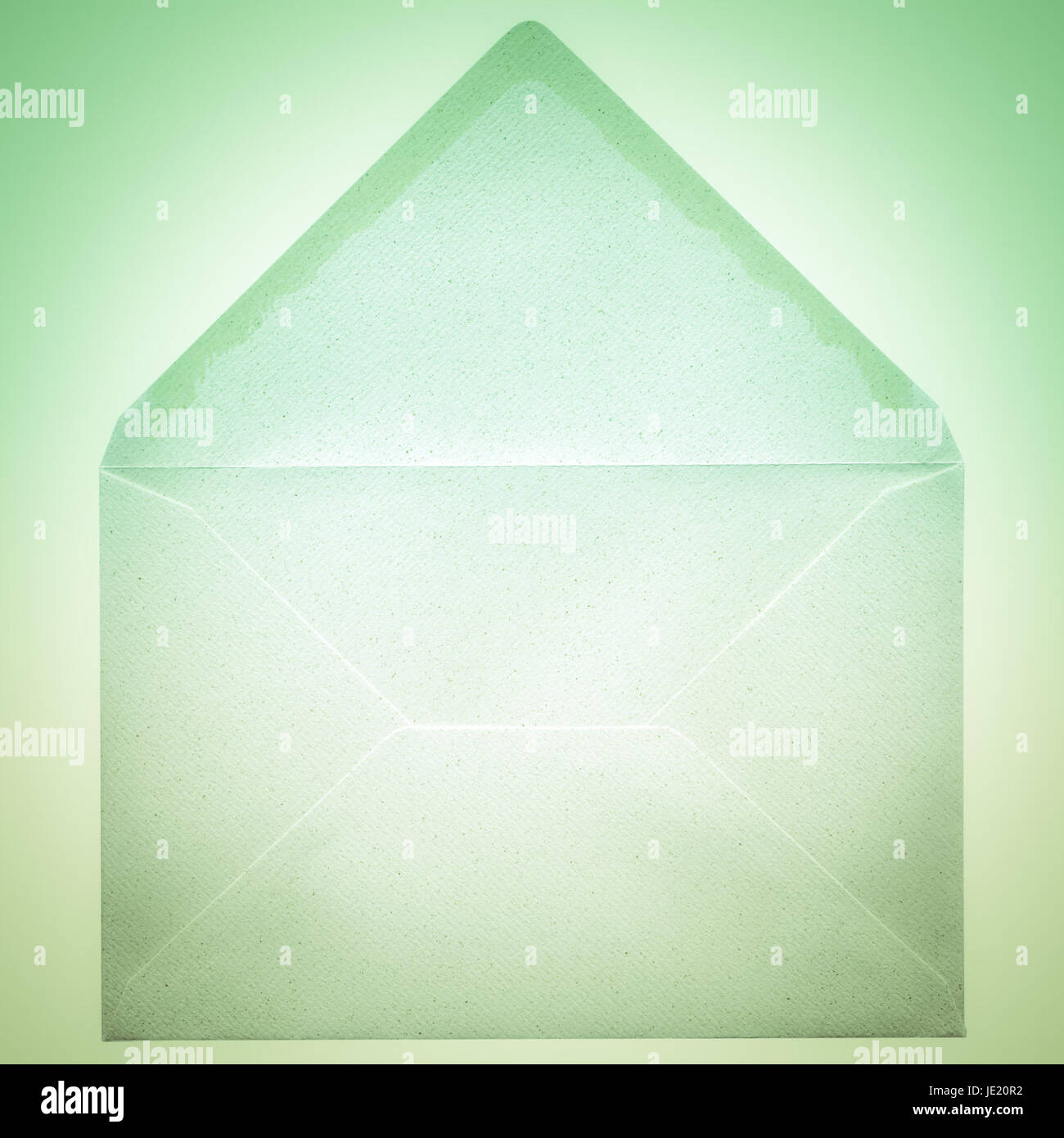 Vintage looking Letter or small packet envelope isolated over white ...