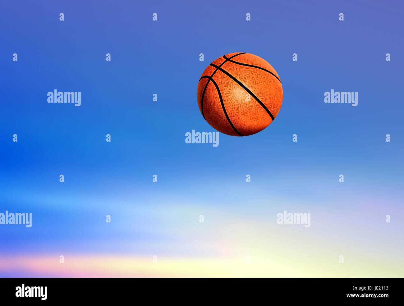 Basketball under Blue Sky Stock Photo - Alamy