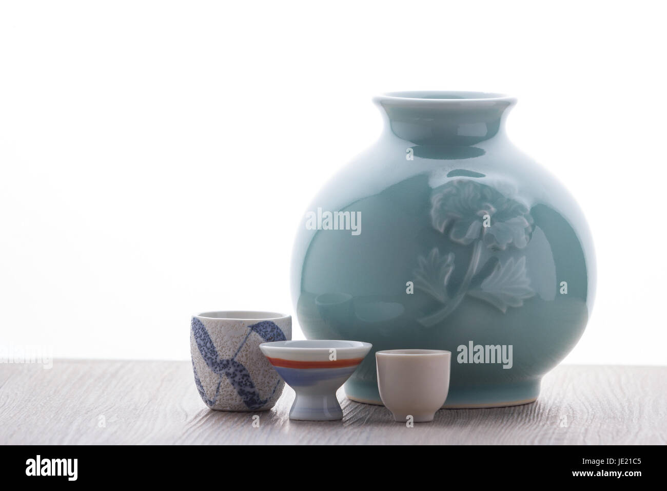 Japanese Sake drinking set on old wood texture background Stock Photo ...