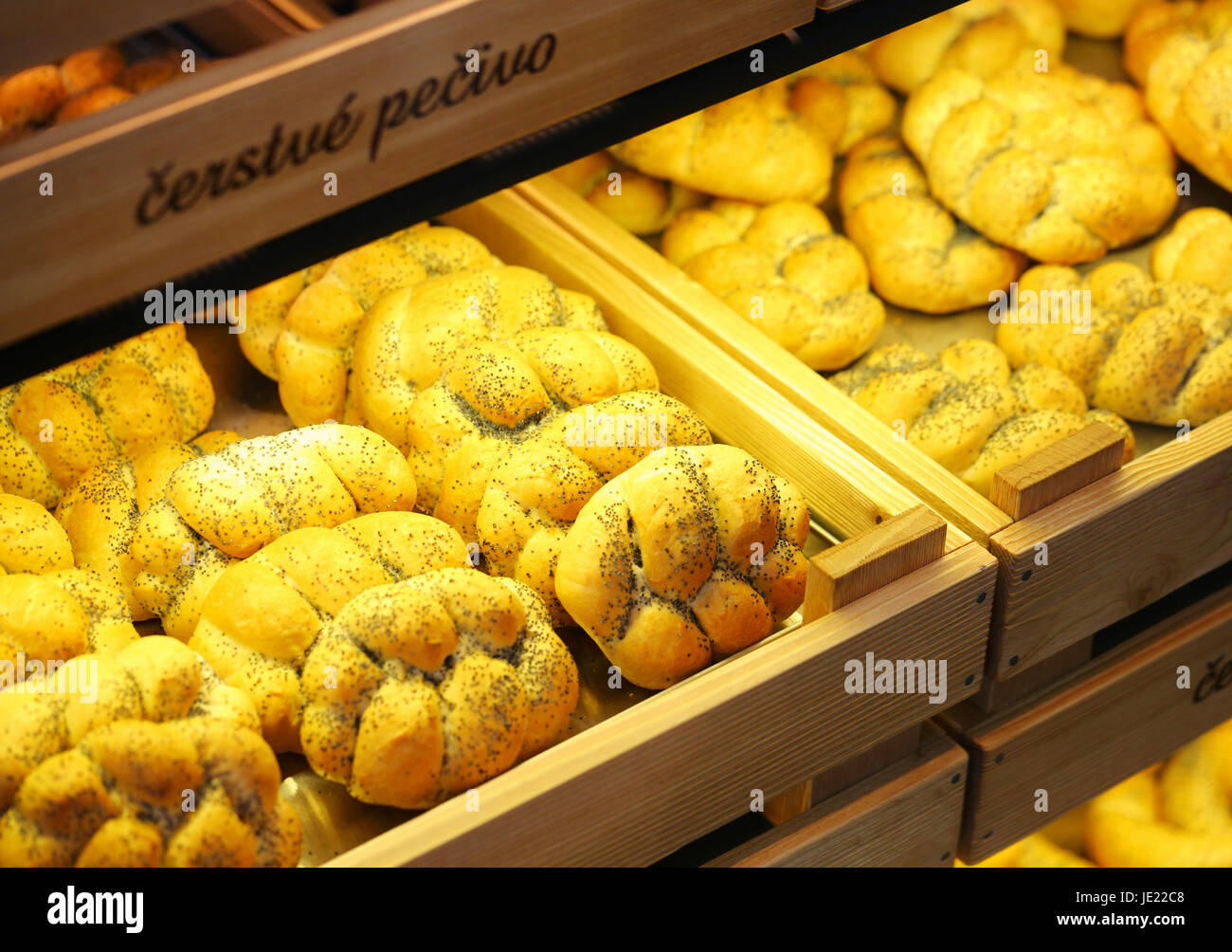 Fresh bread buns in wooden crates Stock Photo - Alamy