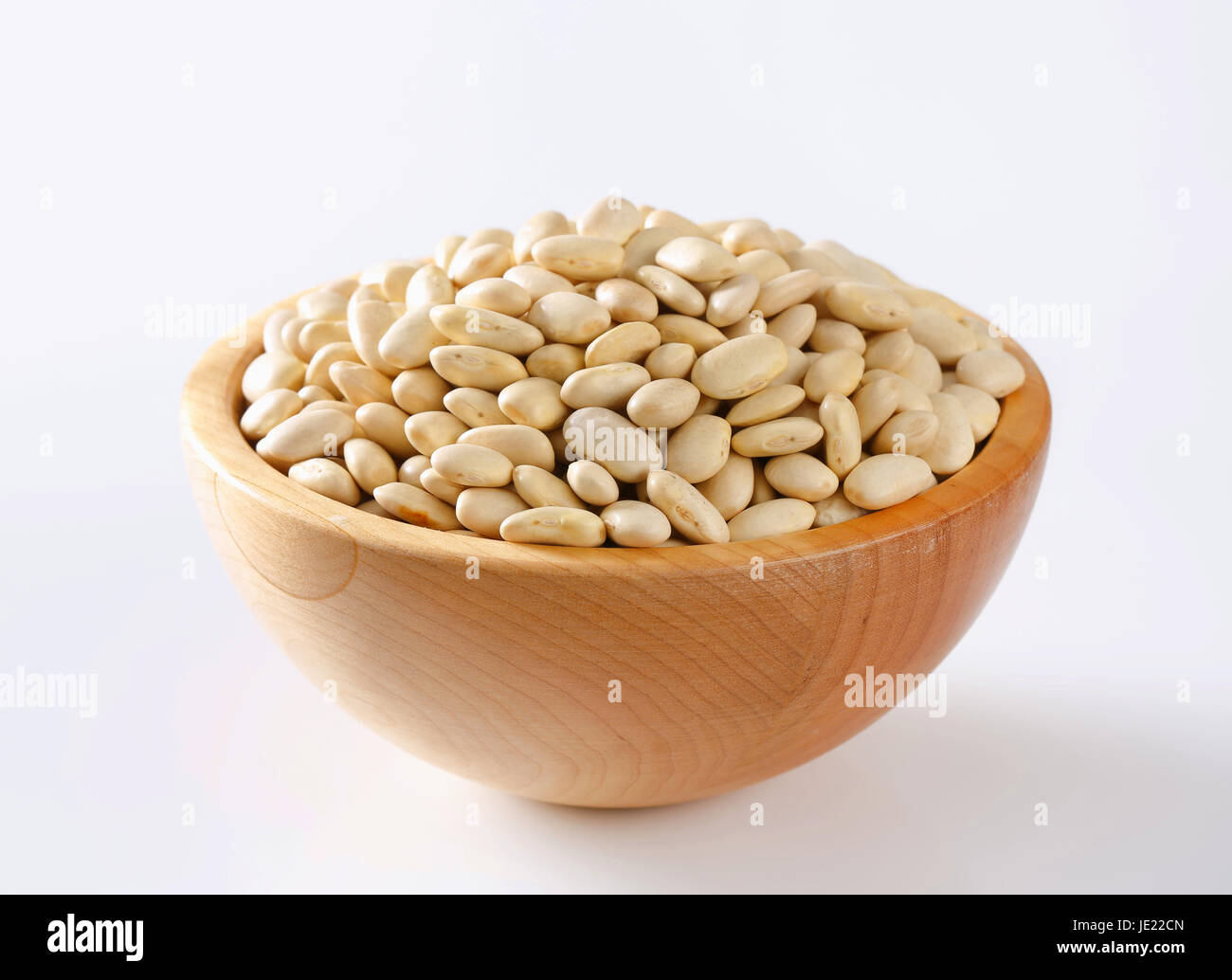 Bowl of raw white beans Stock Photo - Alamy
