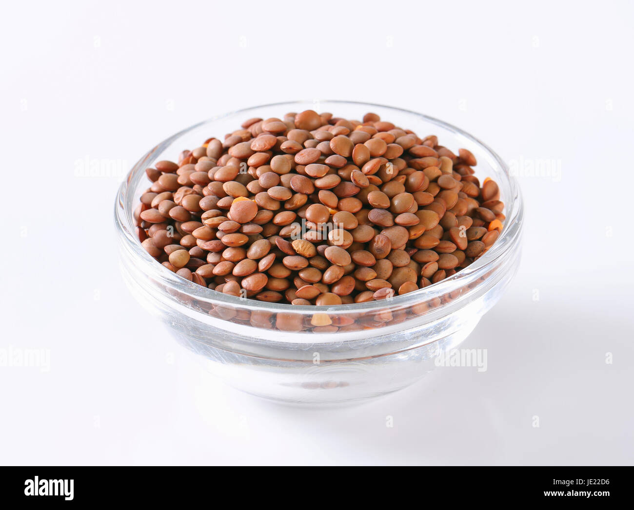 Bowl of whole red lentils Stock Photo - Alamy