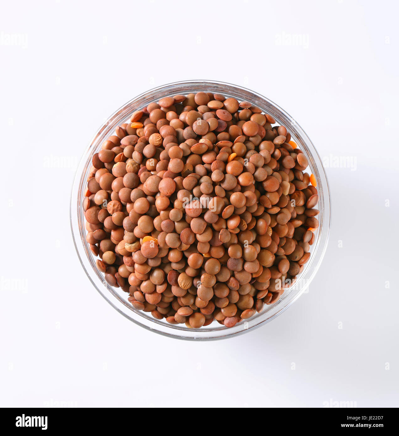 Bowl of whole red lentils Stock Photo - Alamy