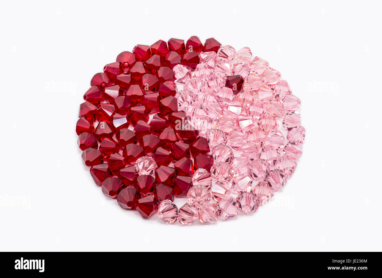 Red And Pink Crystals In Shape Of Ying and Yang Stock Photo - Alamy
