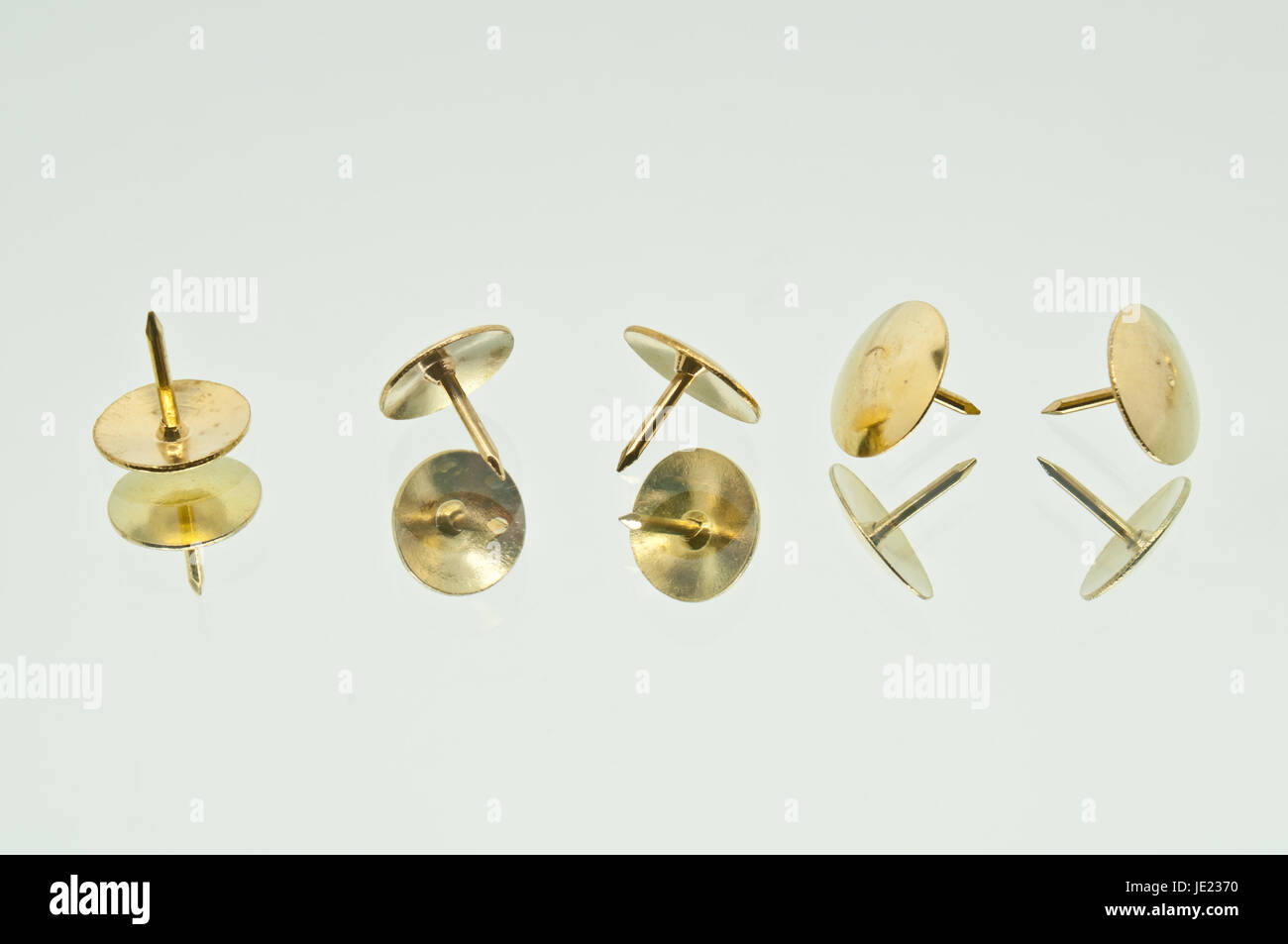 Collection of Five Lying Thumbtacks Stock Photo - Alamy