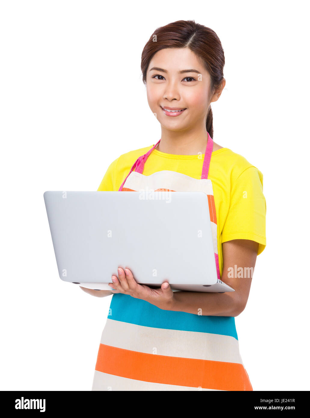 Housewife use of notebook computer Stock Photo - Alamy