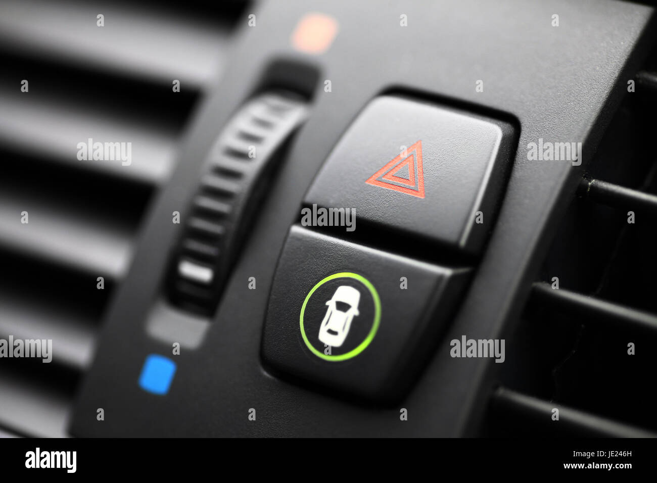 Detail of a warning button in a car Stock Photo - Alamy