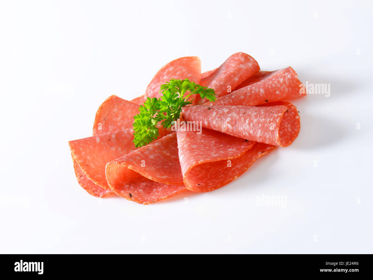 Thin slices of fermented salami Stock Photo - Alamy