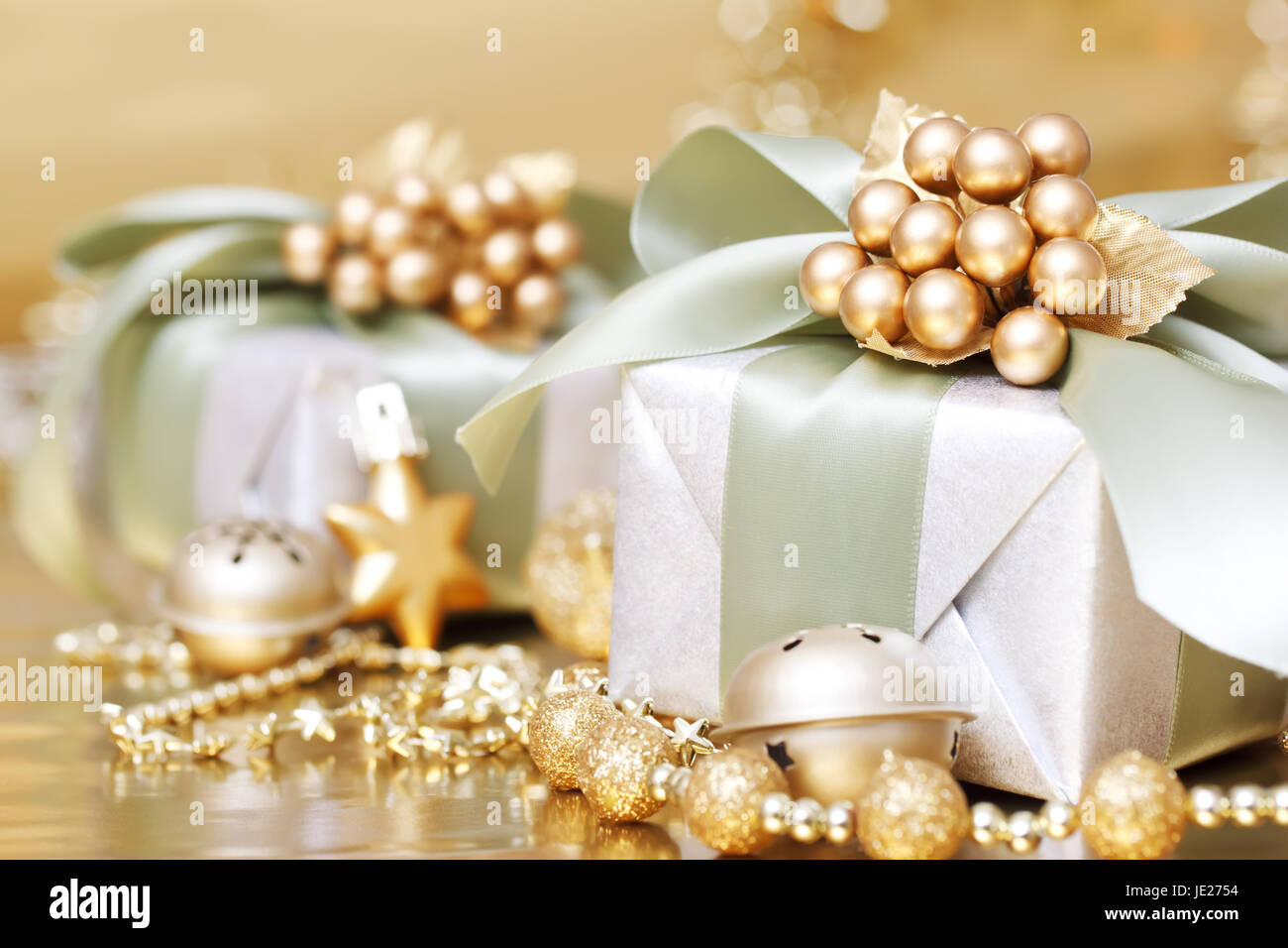 Christmas Gift Box with Bells and Beads Stock Photo - Alamy