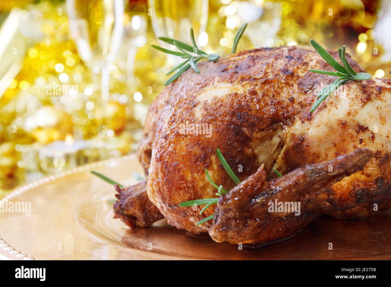 Whole Roasted Chicken with a Holiday Celebration Dinner Table Stock ...