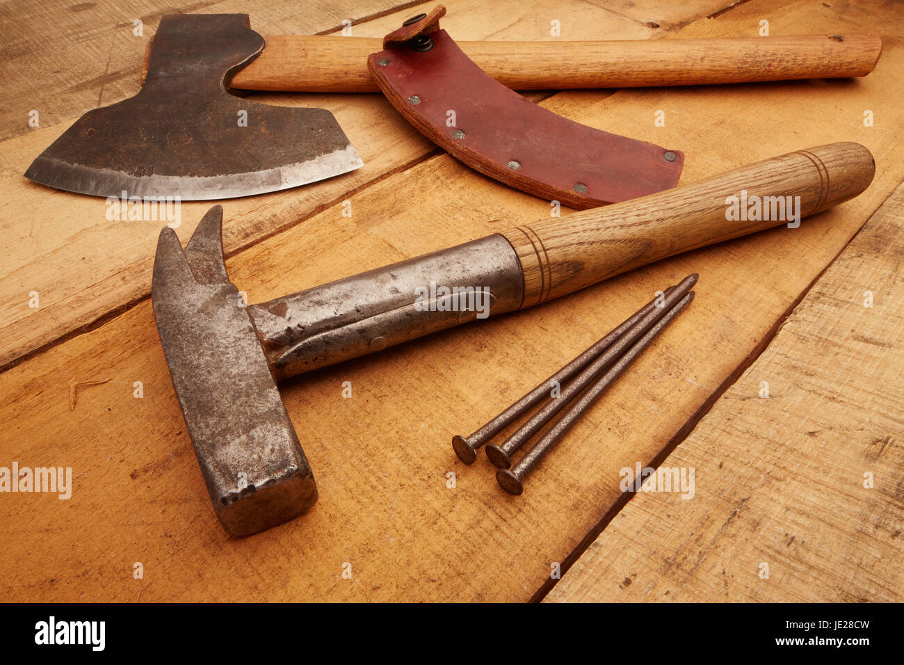 carpenter's hand tools on rustic floorboards floor Stock Photo - Alamy