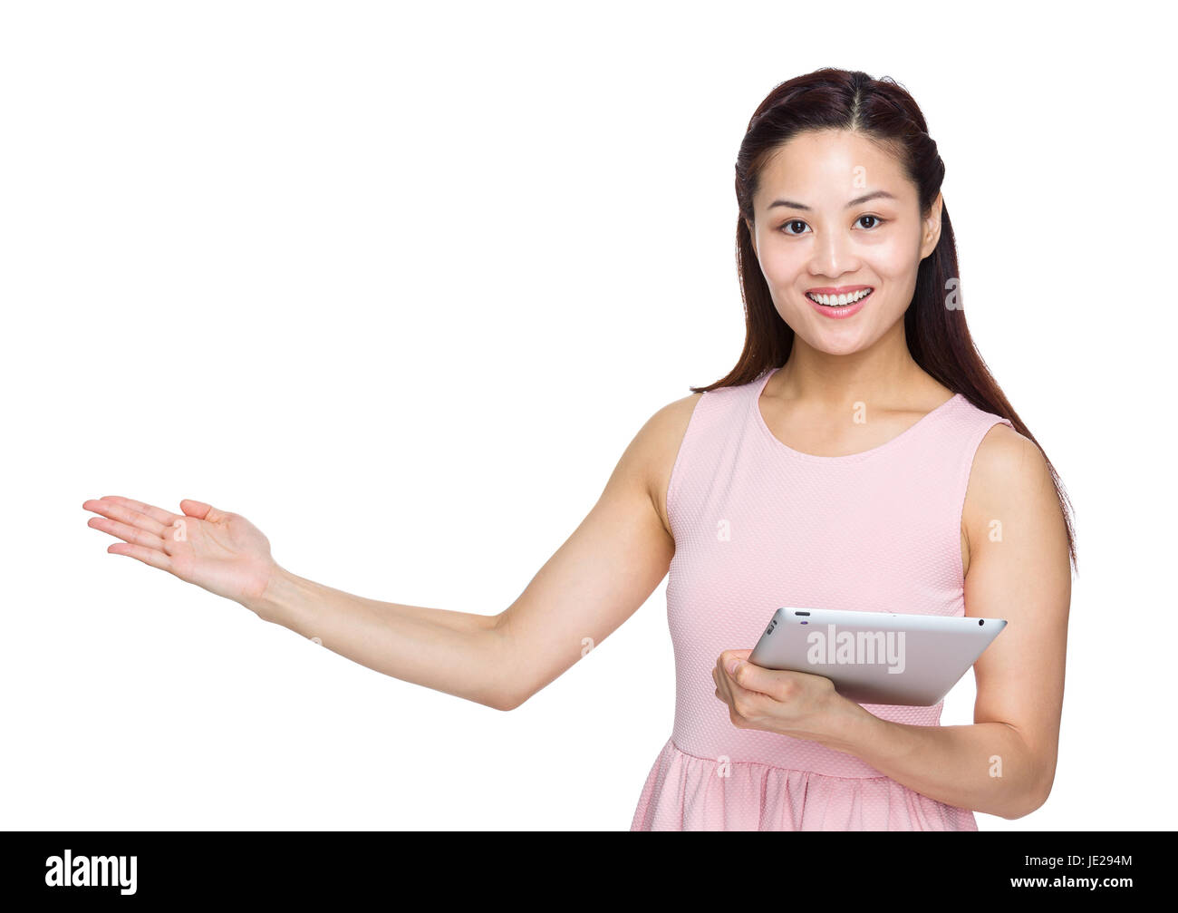 Woman present with tablet Stock Photo - Alamy