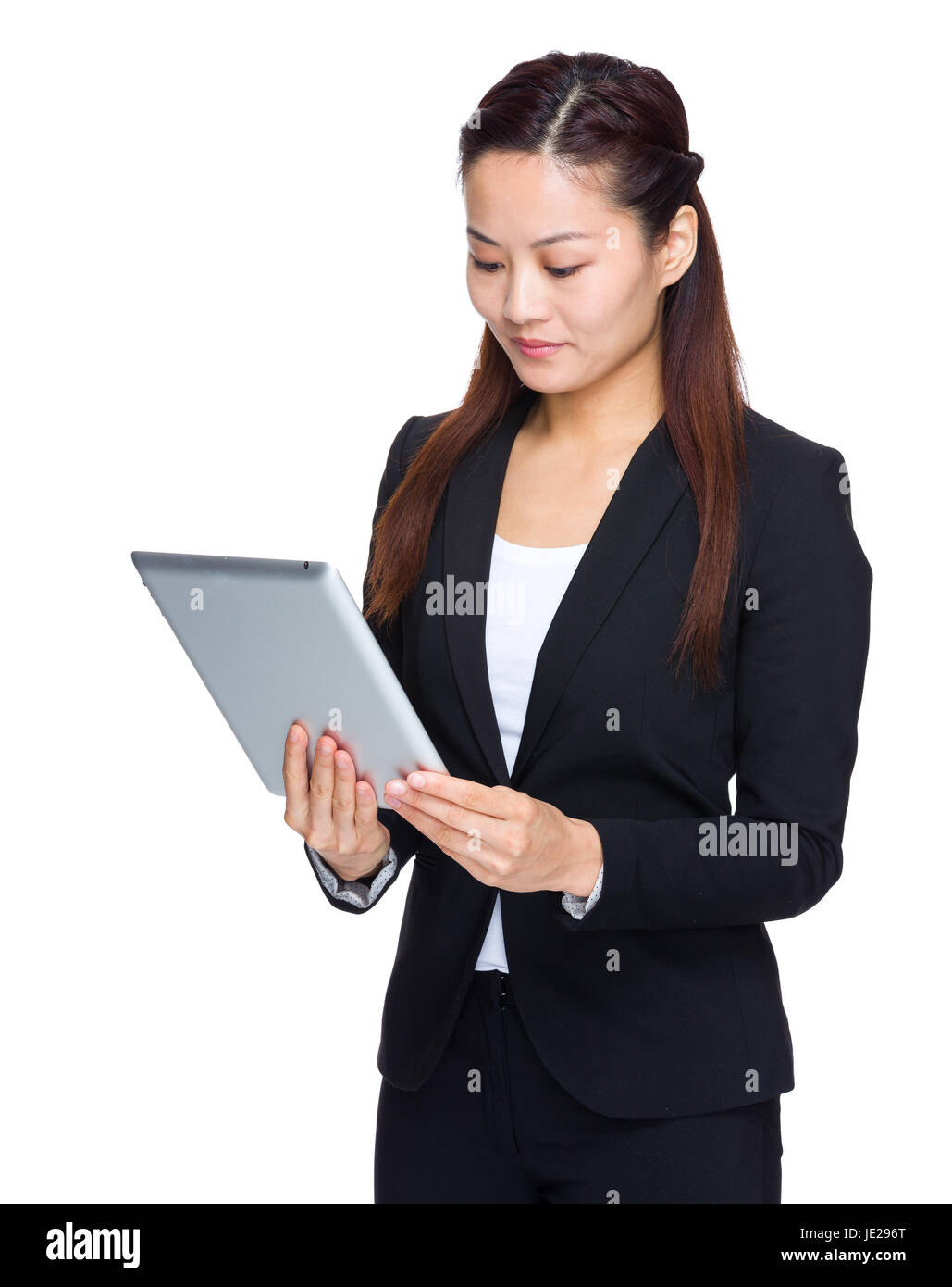 Businesswoman use of tablet Stock Photo - Alamy
