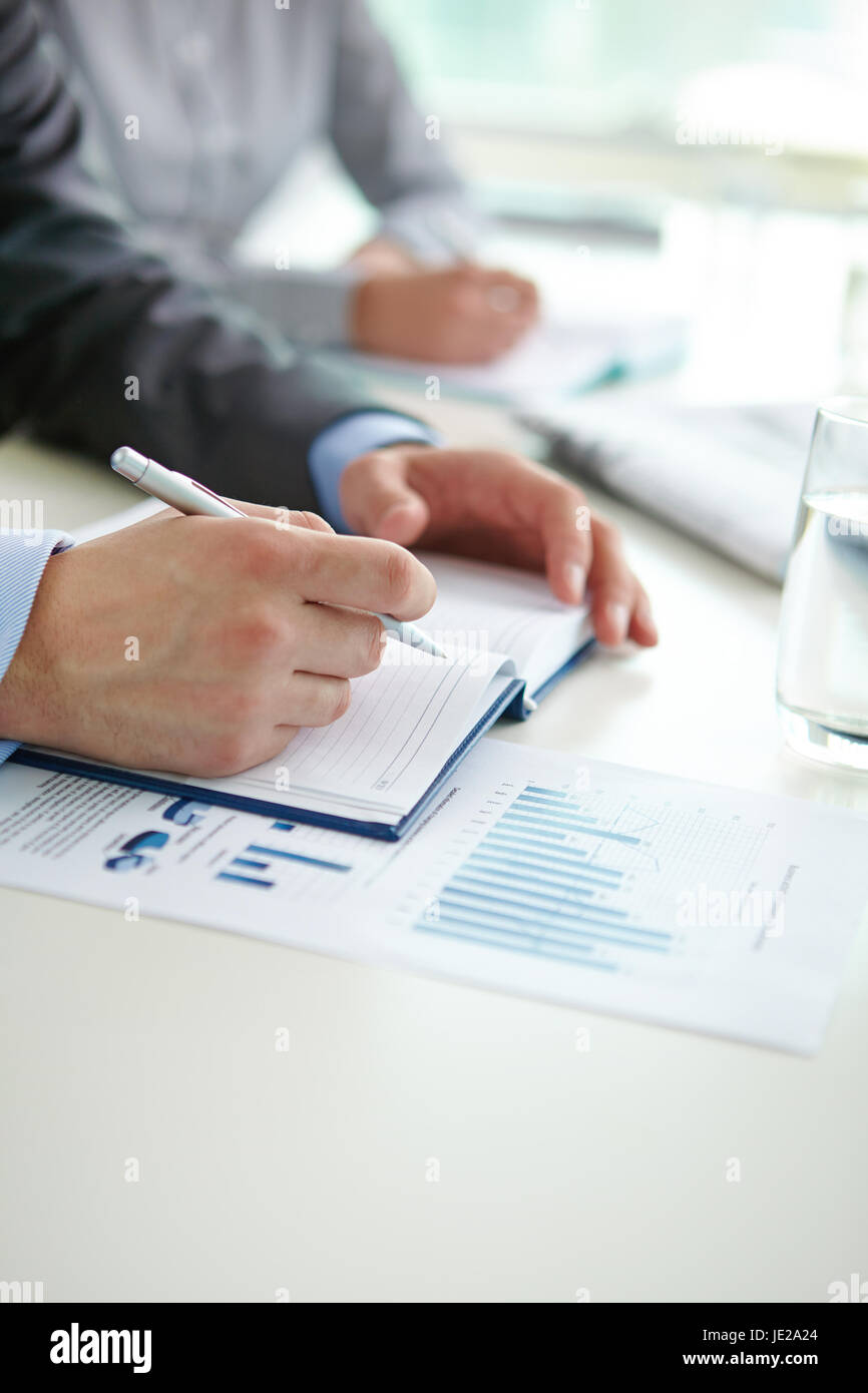 Putting down pen hi-res stock photography and images - Alamy