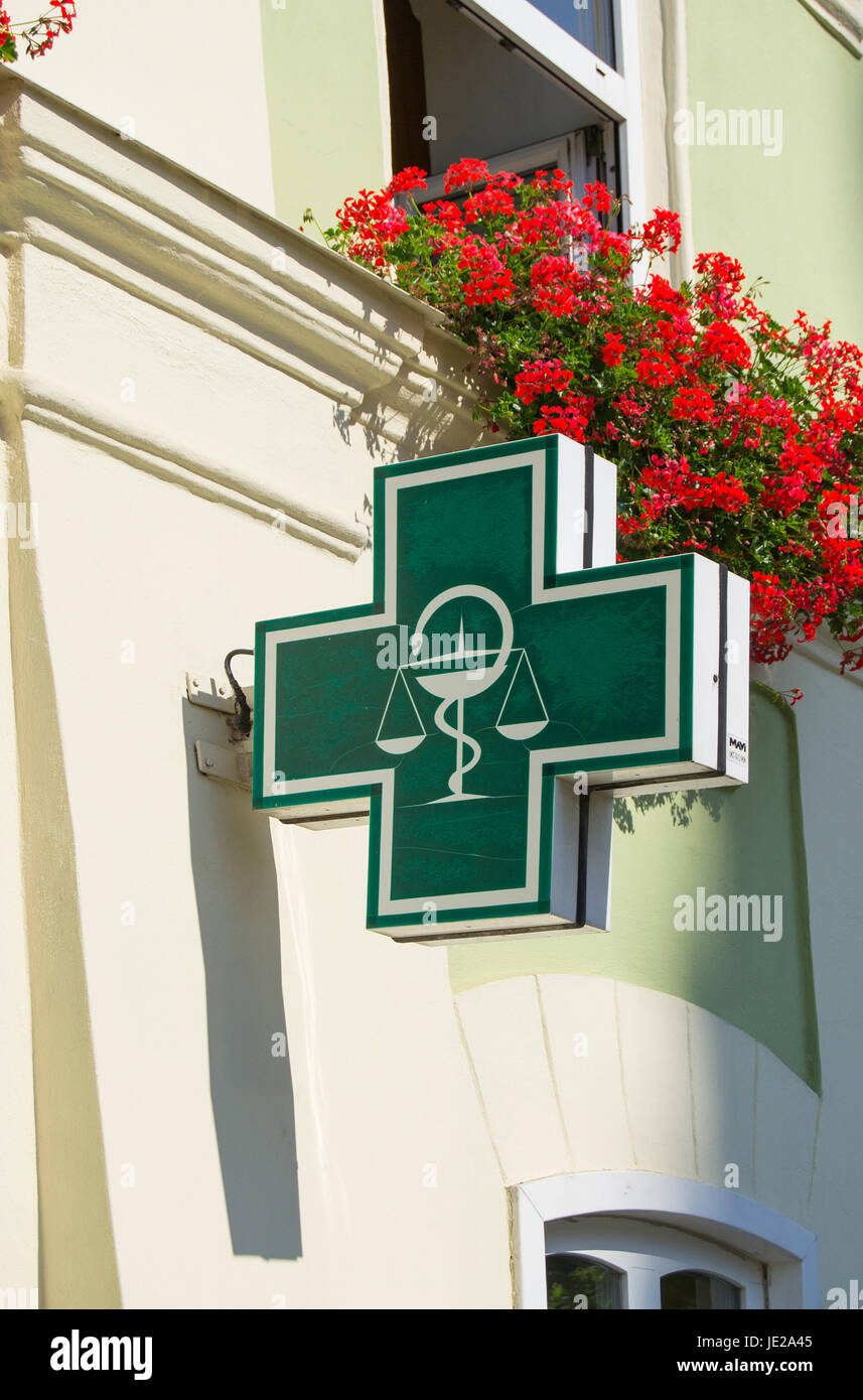 Pharmacy sign on side of the house Stock Photo - Alamy