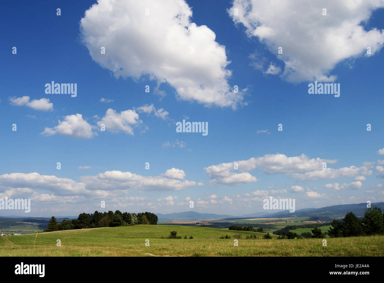Landscape with villages and clouds Stock Photo - Alamy