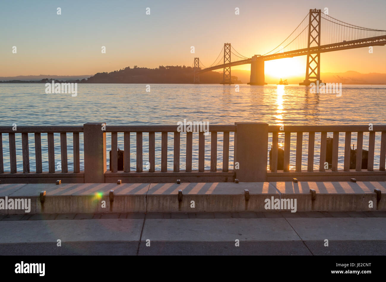 Walking up to a Sunrise behind the Bay Bridge Stock Photo - Alamy