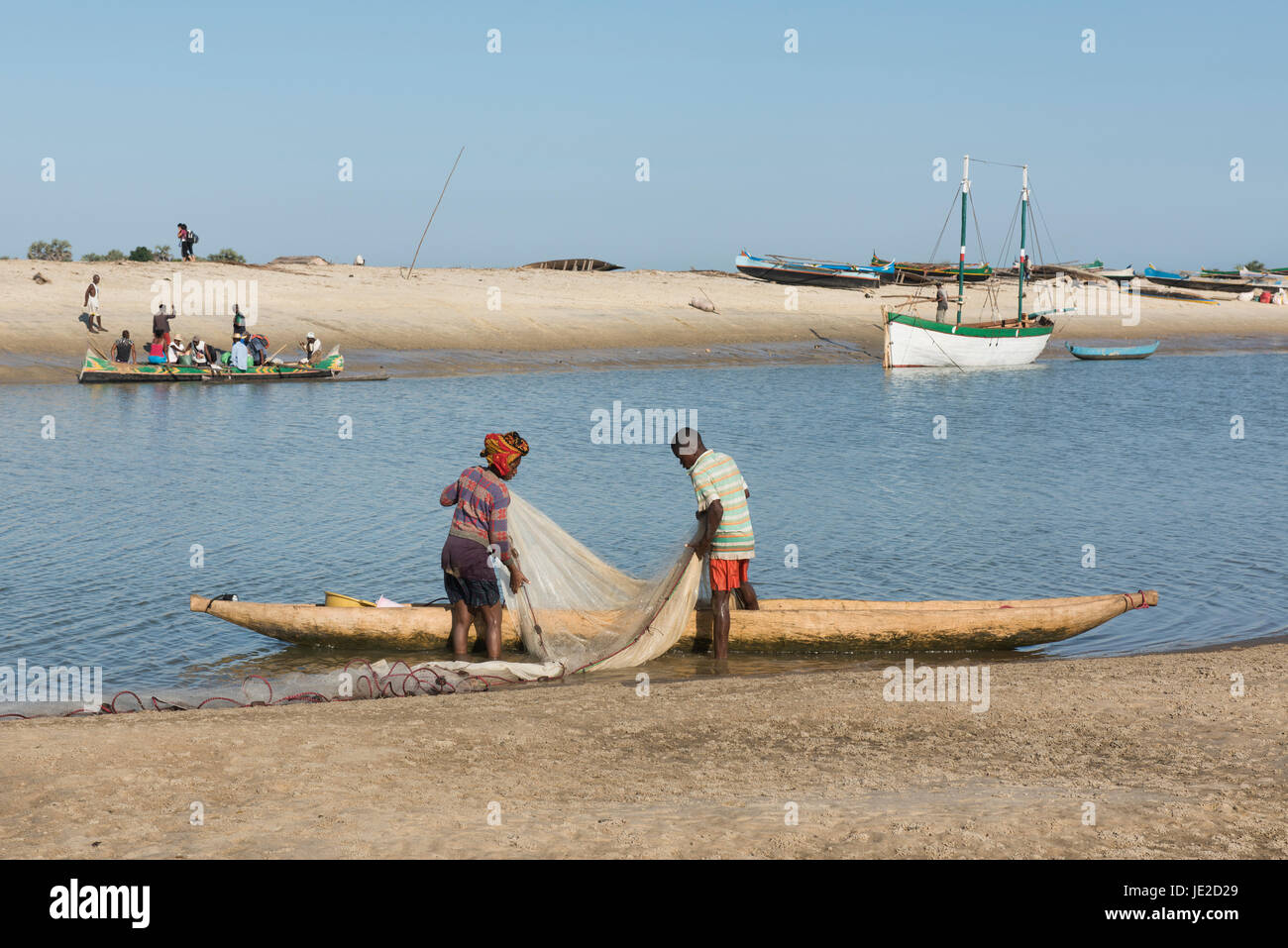 Malagasy couple working their fish nets, Morondava, Madagascar Stock ...